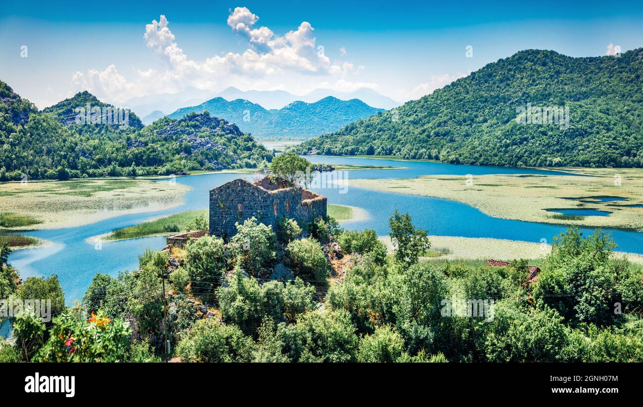 Panoramic view of Rijeka Crnojevica river, Skadar lake location. Splendid summer scene of Karuc ...