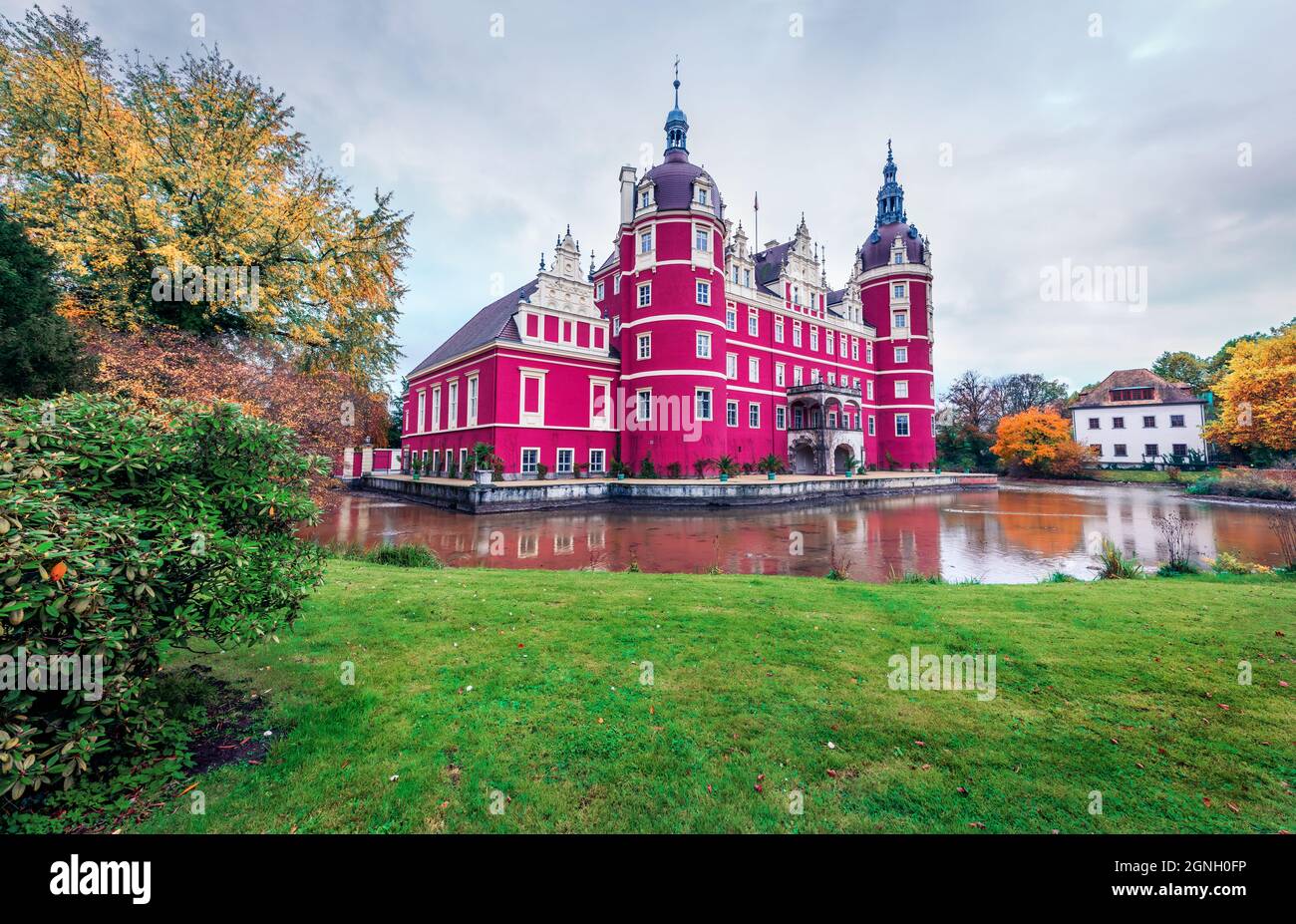 Captivating autumn morning of Muskau castle. Rainy morning scene in ...