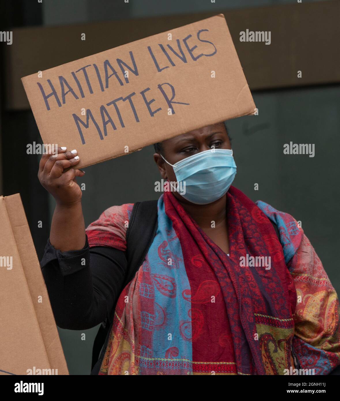 September 24, 2021, Boston, Massachusetts, USA: A protesters rally with ...