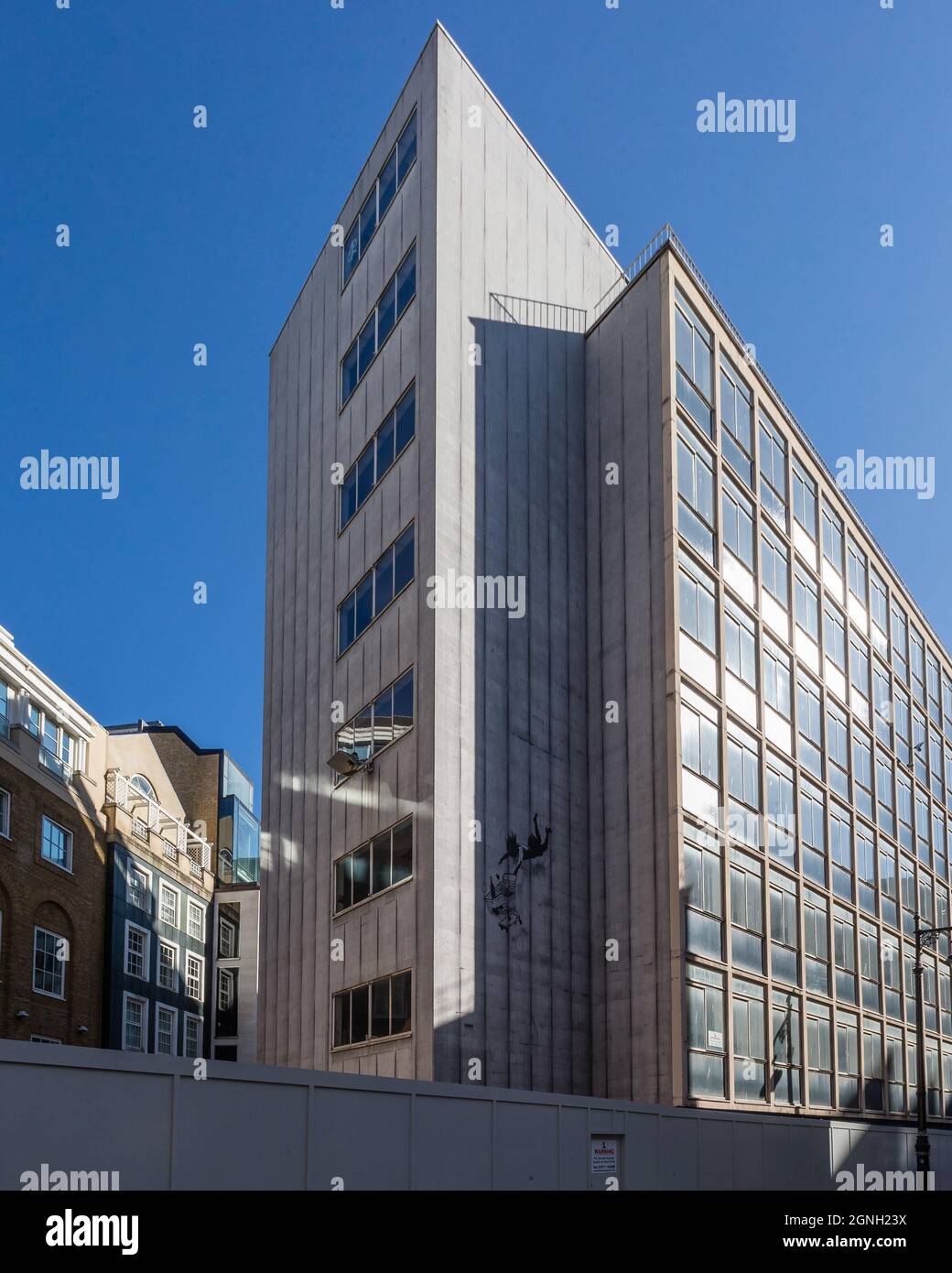 The falling shopper banksy hi-res stock photography and images - Alamy