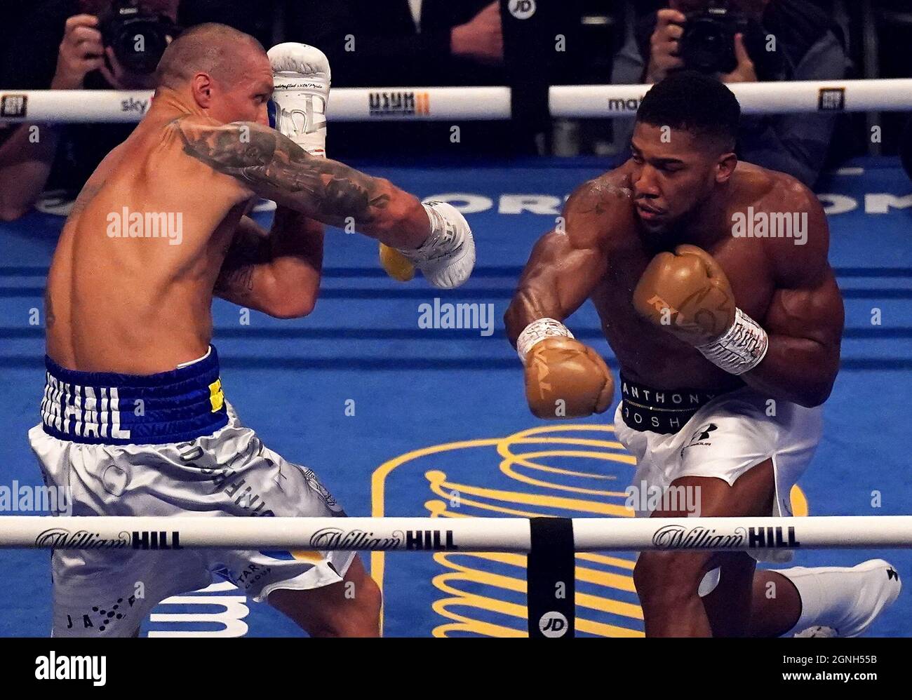 Anthony Joshua in action against Oleksandr Usyk in the WBA, WBO, IBF and IBO World Heavyweight ...