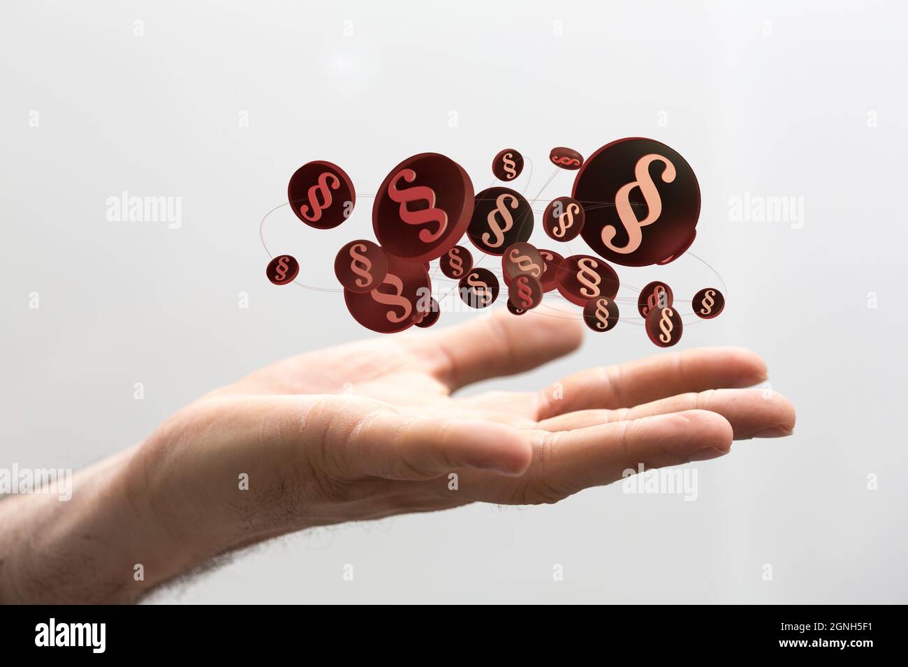 3d render of a Symbol of Law and Justice and a male hand on a blurry ...