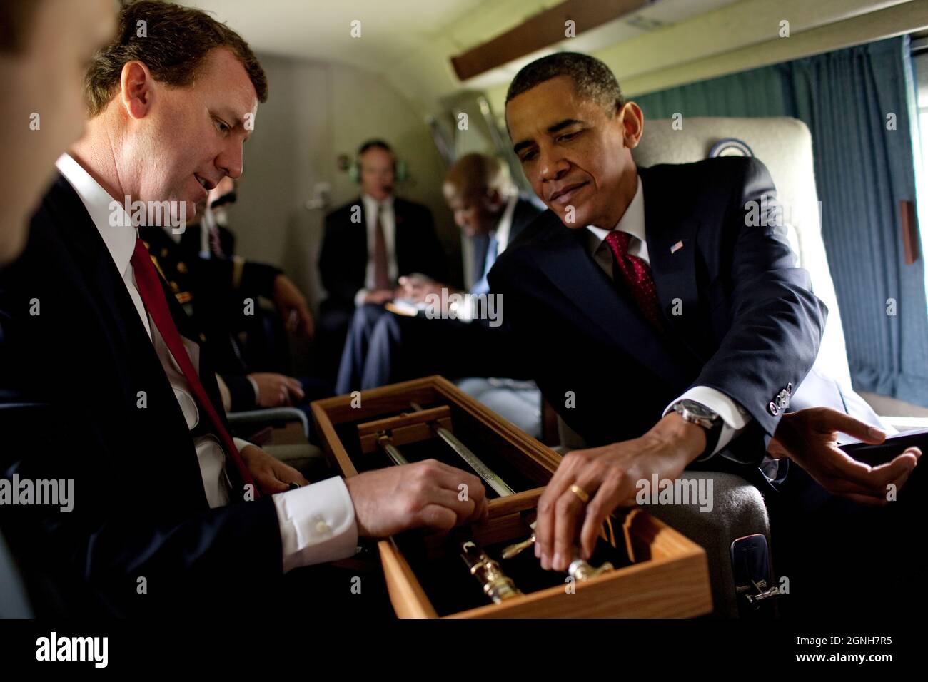 President Barack Obama and Trip Director Marvin Nicholson look at a ...