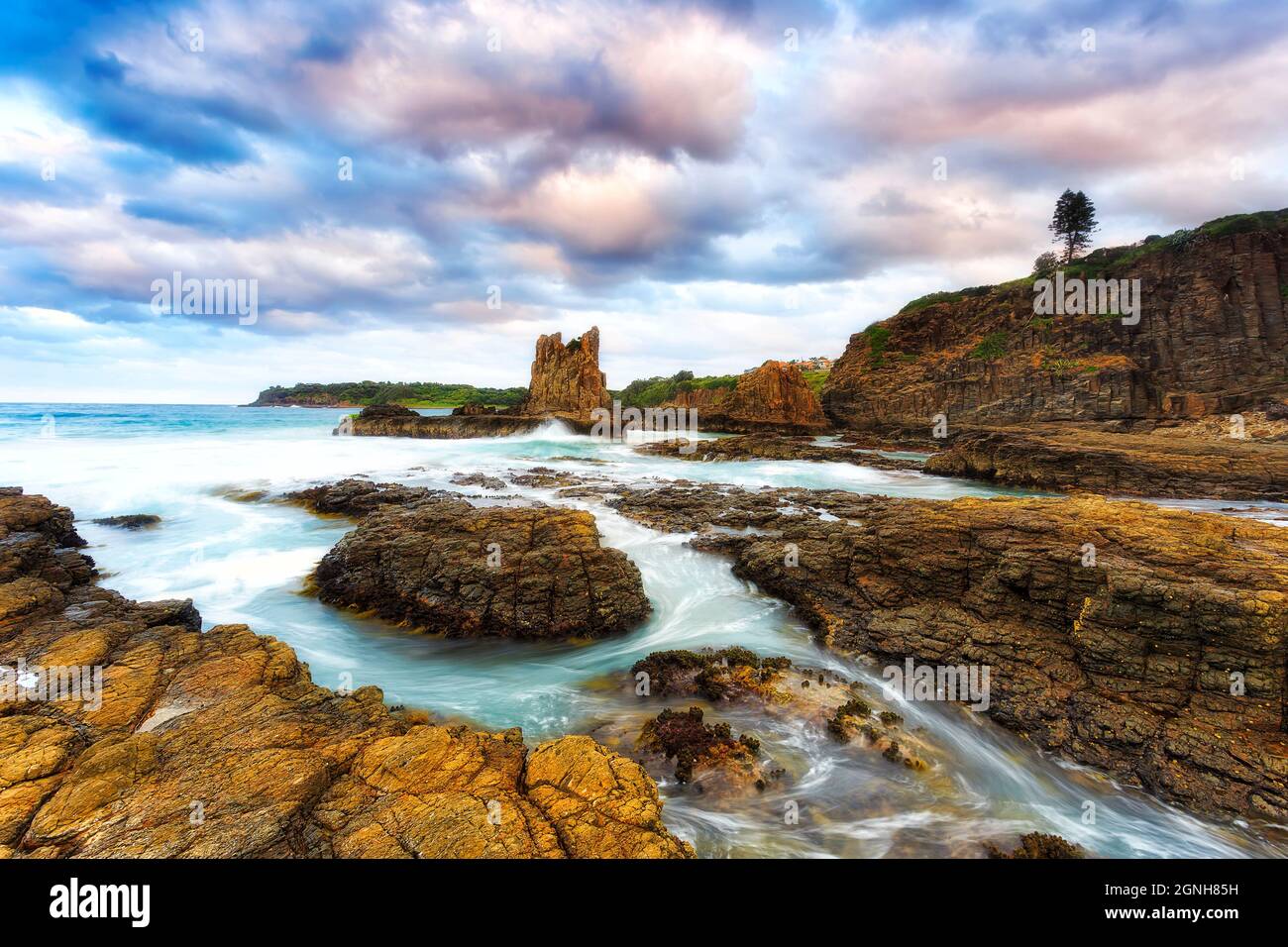 Cathedral rock off Bombo beach near basalt quarry in coastal Kiama town ...