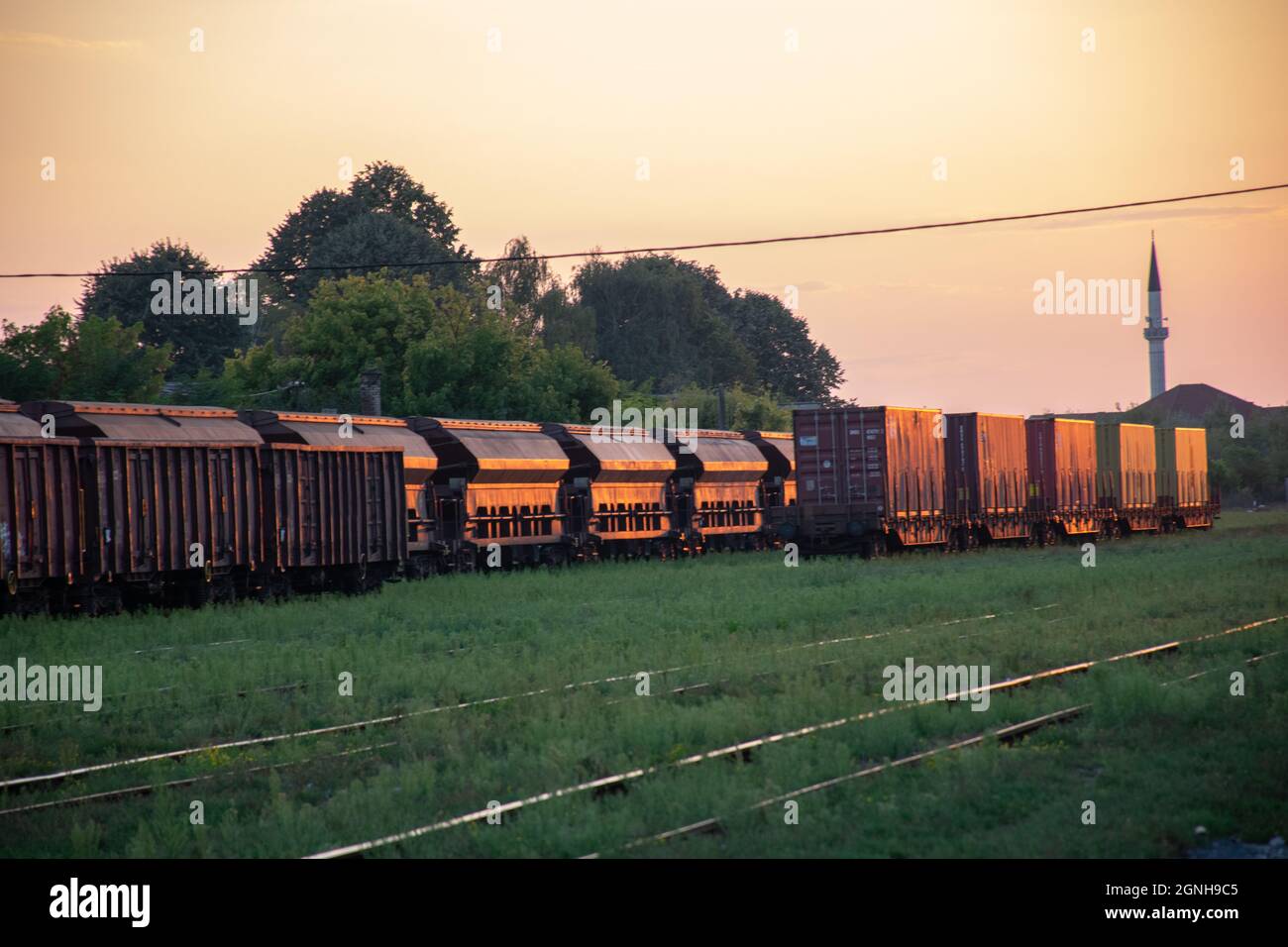 Freight train red sunset hi-res stock photography and images - Alamy