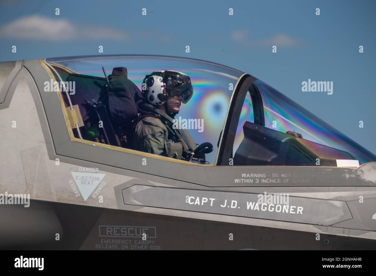U.S. Marine Corps Capt. Joshua Waggoner, an F-35B pilot, sits in the ...