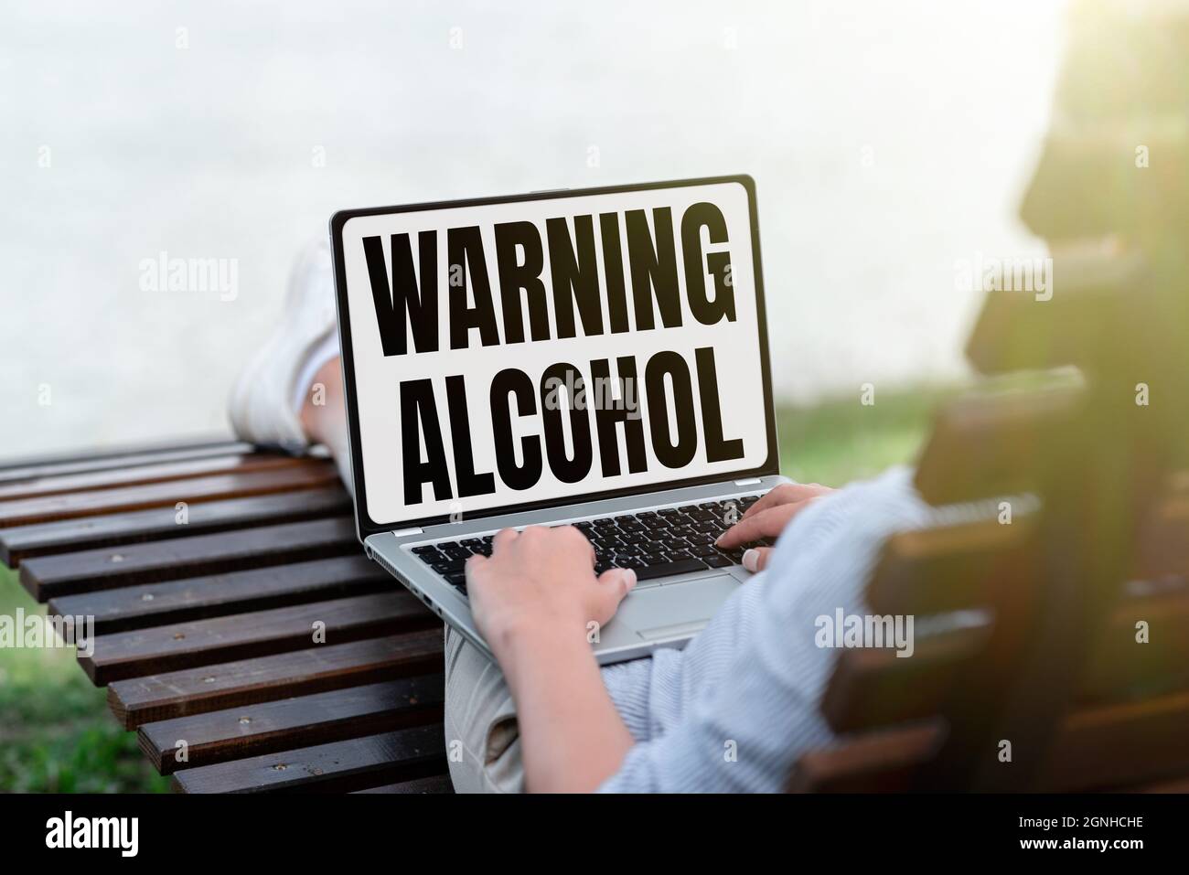 Sign displaying Warning Alcohol. Business concept messages appear on ...