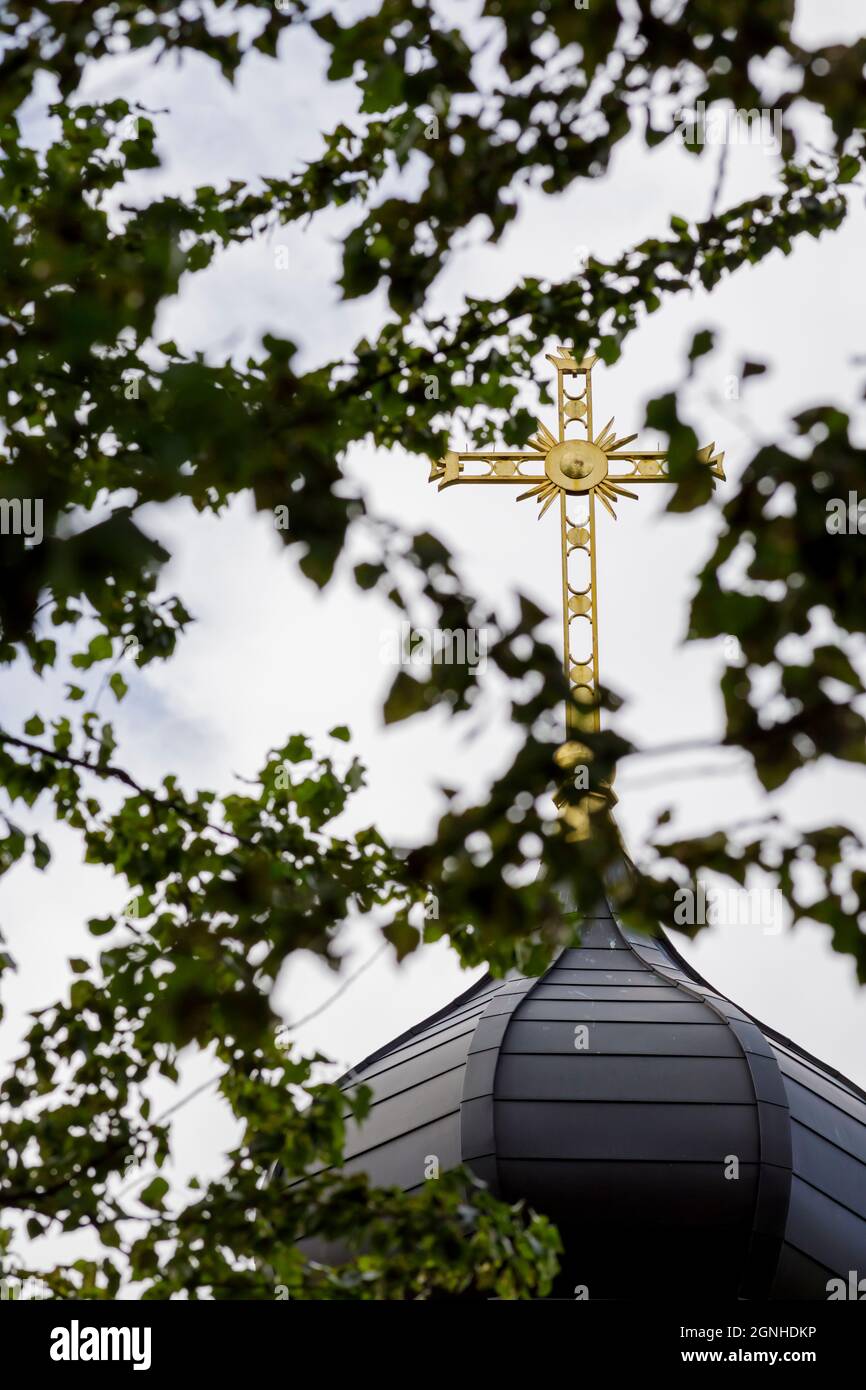 Christian cross on the onion dome of the church. Gilded Church Cross ...