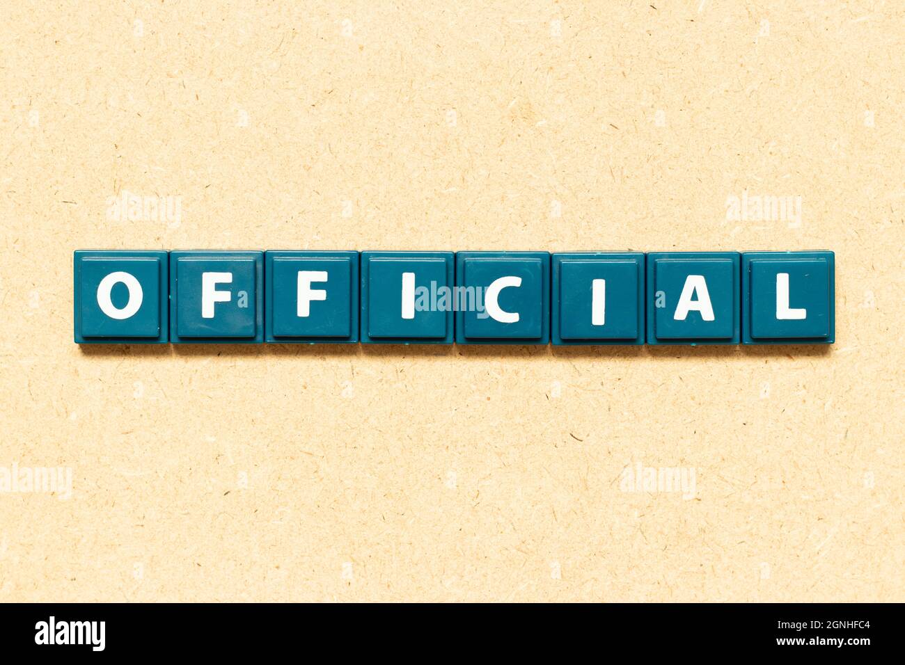 Tile alphabet letter in word official on wood background Stock Photo ...