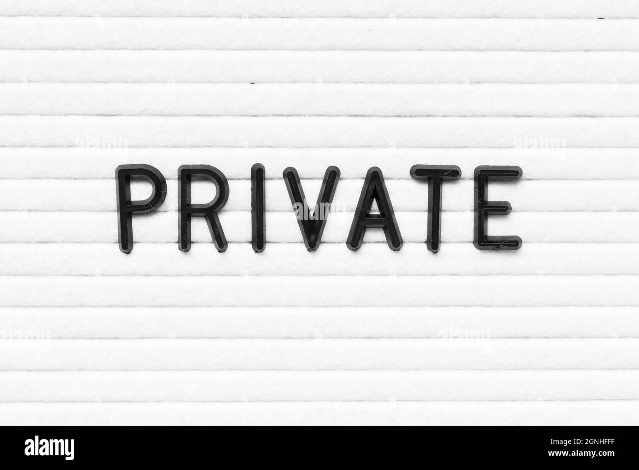 Black letter in word private on white felt board background Stock Photo ...