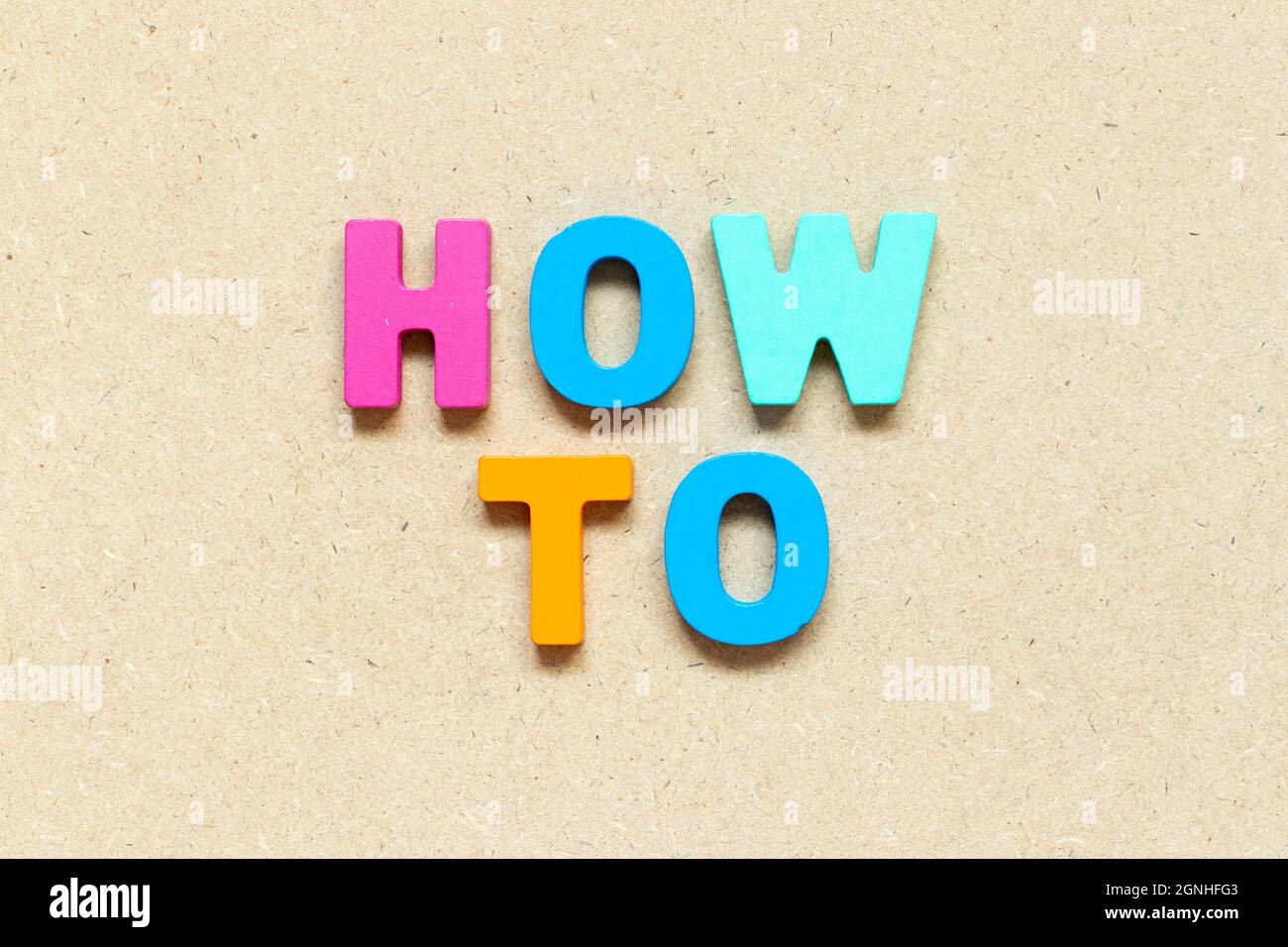 Color alphabet letter with word how to on wood background Stock Photo ...
