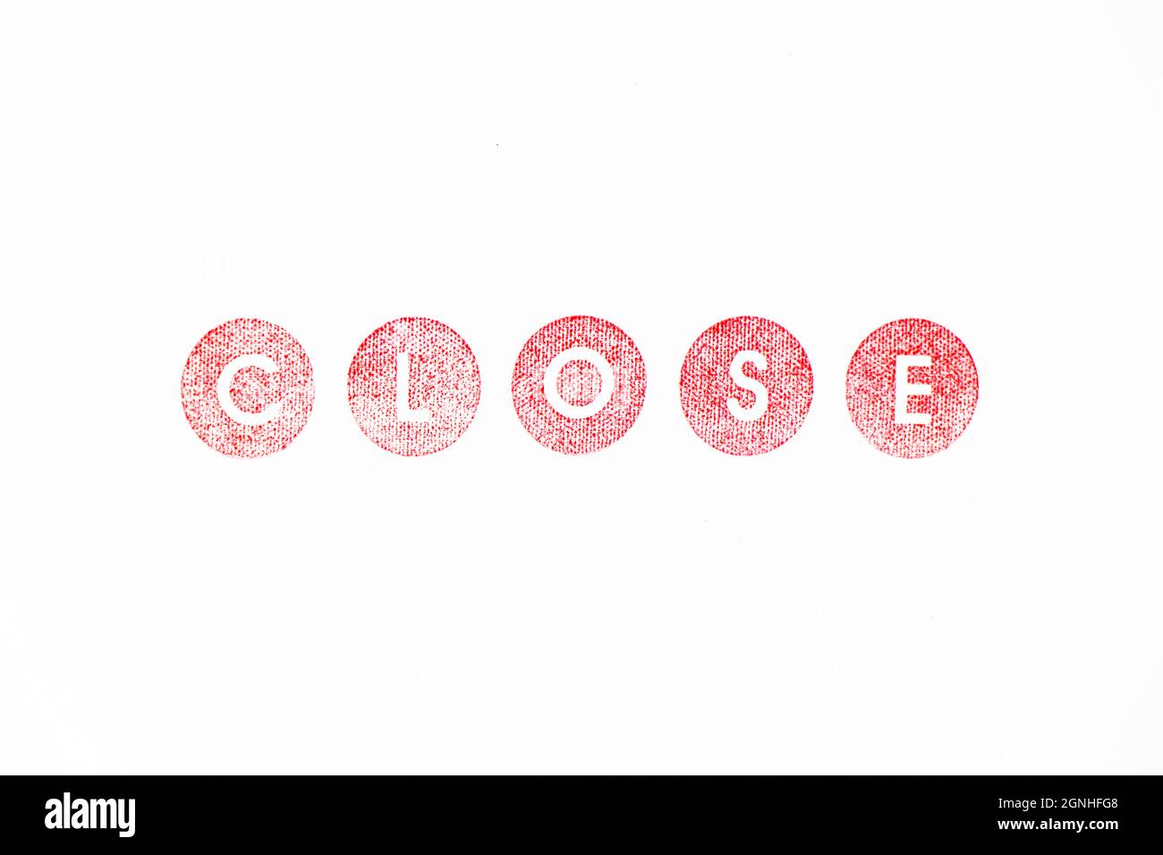 Red color rubber stamp in word close on white paper background Stock ...