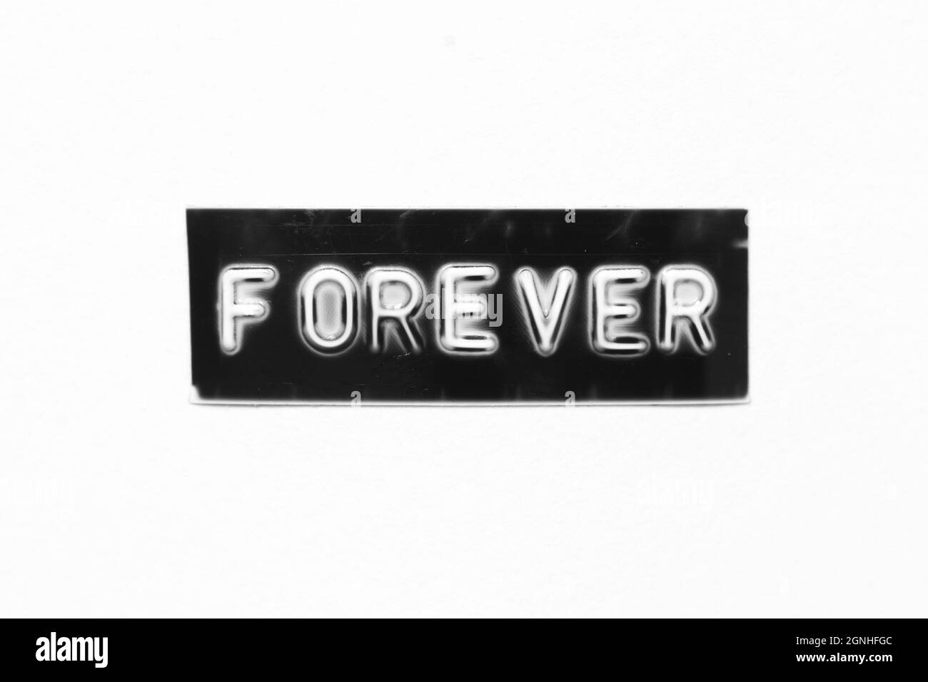 Black color banner that have embossed letter with word forever on white ...