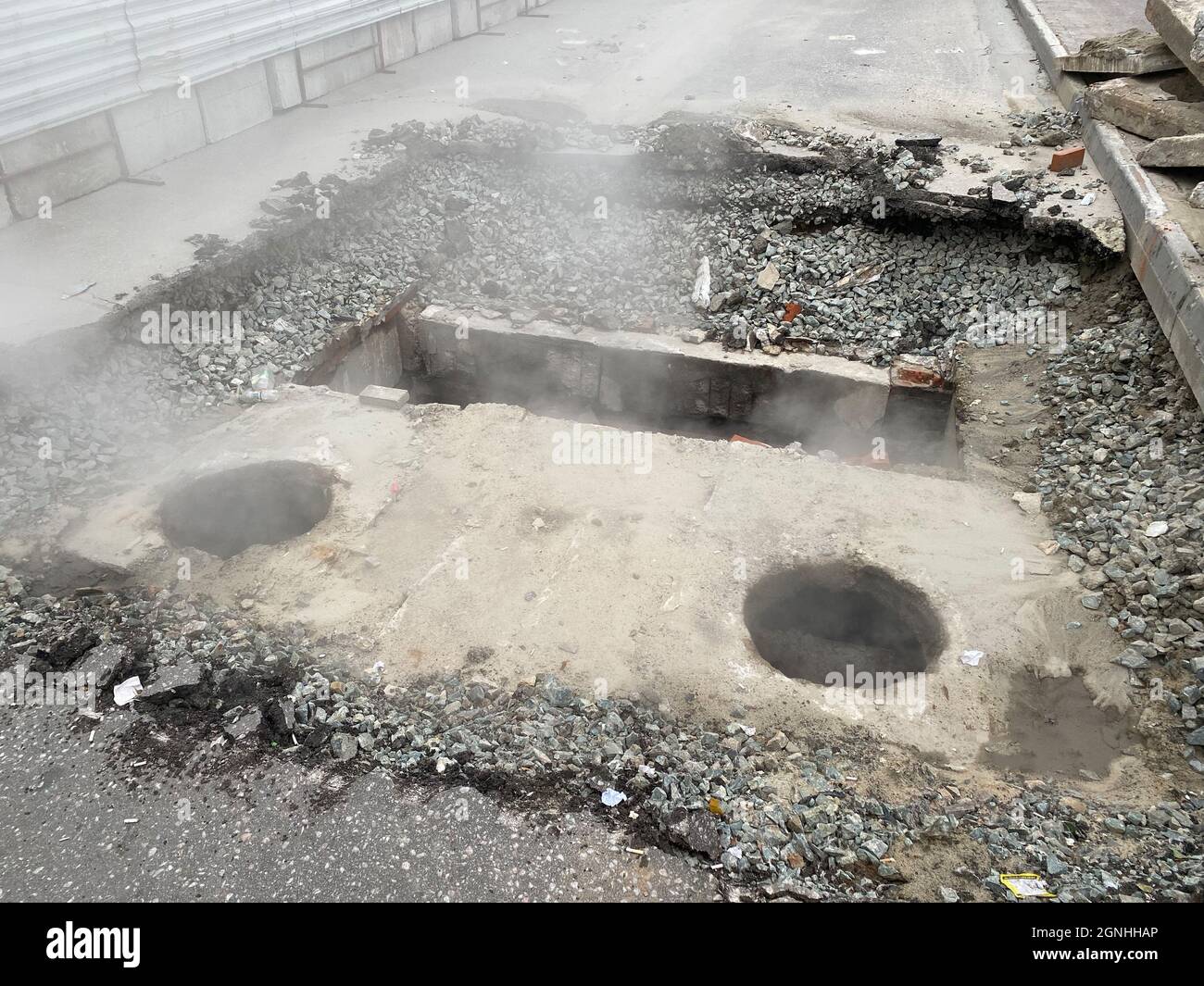 Repair of the heating main. The underground pipe through which steam ...