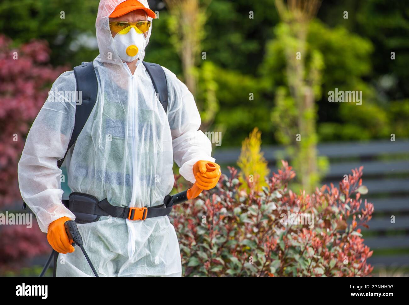 Garden Insecticide Body Protection Suit and Equipment. Worker with ...