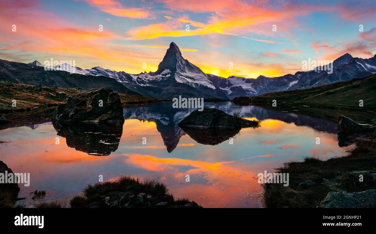 Exciting morning view of Stellisee lake with Matterhorn / Cervino peak ...