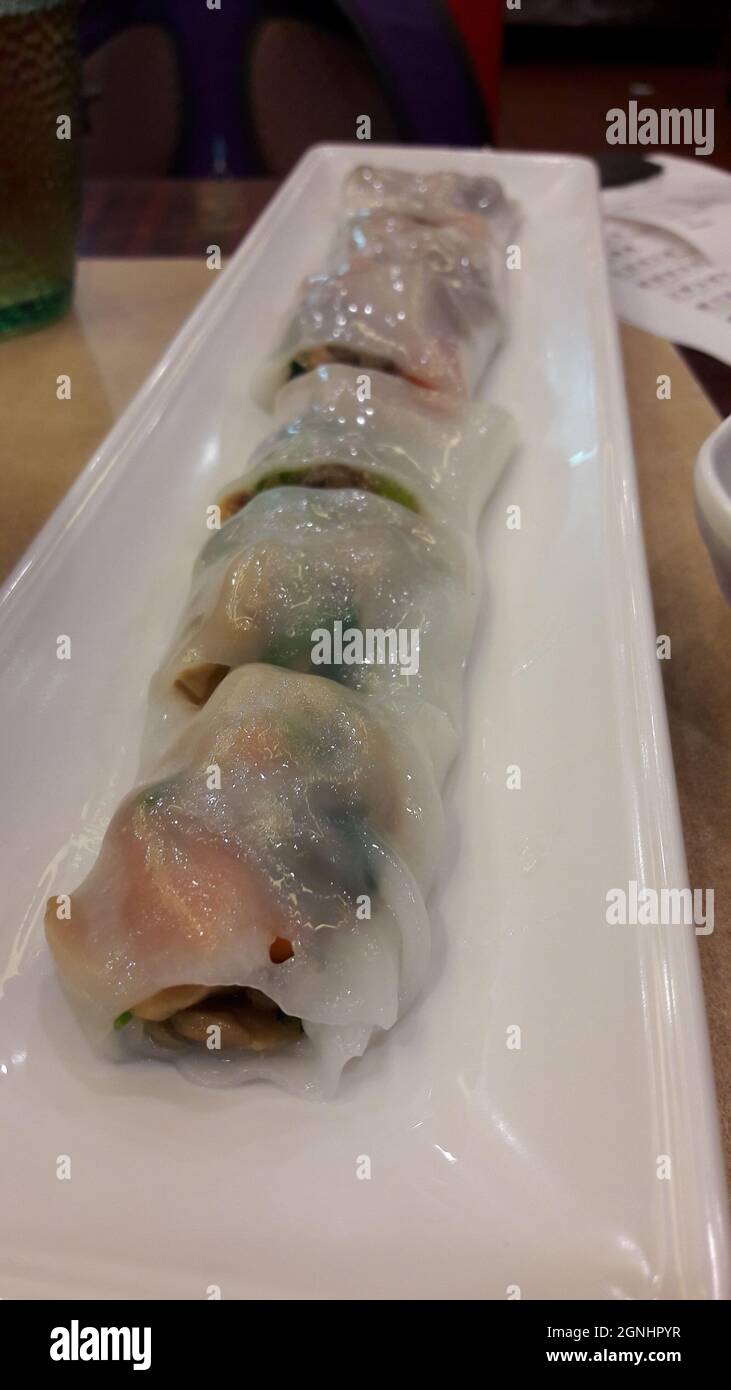 Rice rolls and other dim sum in a market in Hong Kong Stock Photo - Alamy