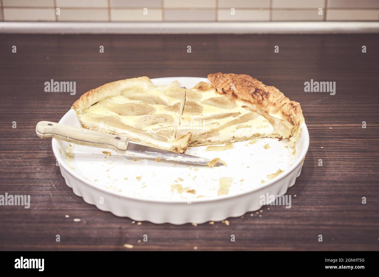 The slices of homemade pie on a kitchen table Stock Photo - Alamy