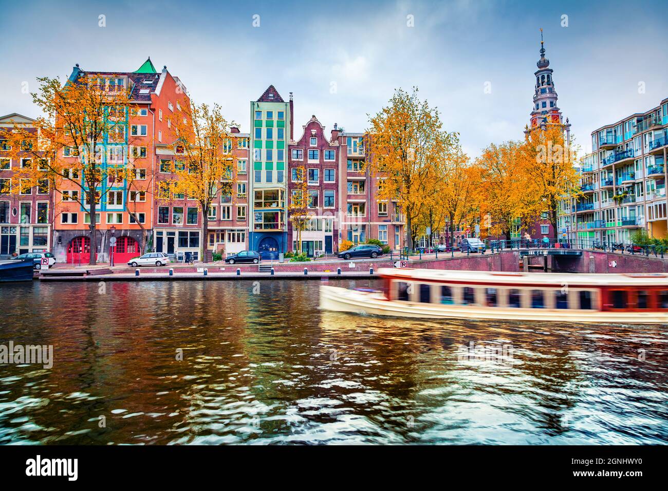Stunning autumn cityscape of Amsterdam. Famous Dutch channels and ...