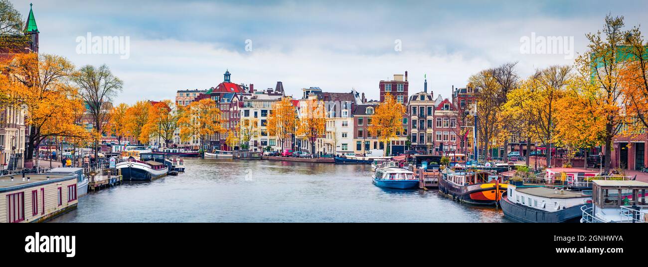 Panoramic autumn view of Amsterdam city. Famous Dutch channels and ...