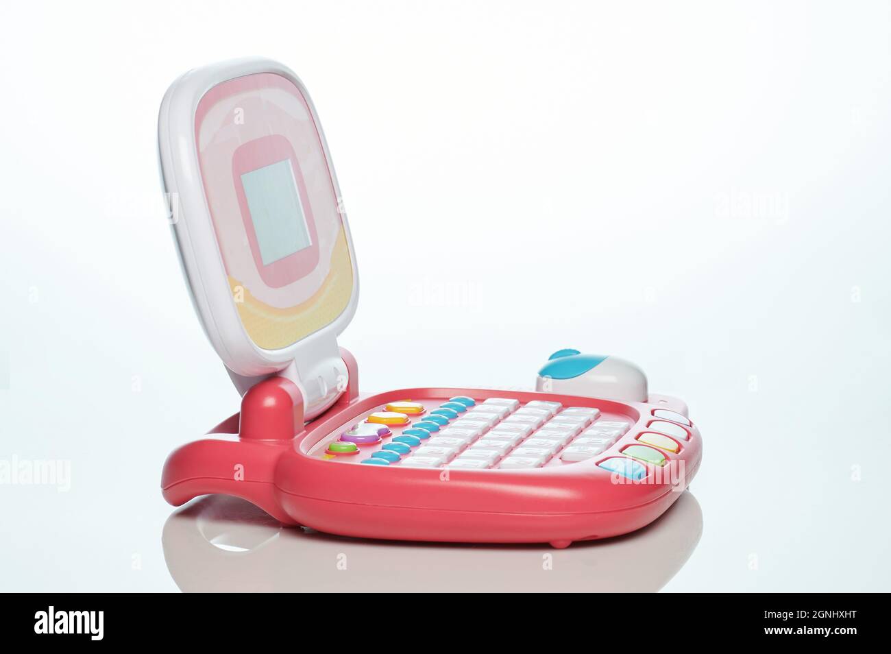 Plastic toy laptop side view isolated on studio background Stock Photo ...