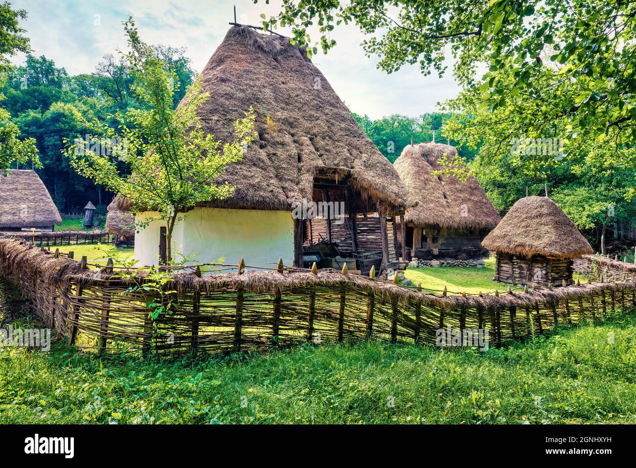 Spectacular summer view of traditional romanian peasant houses. Amazing ...