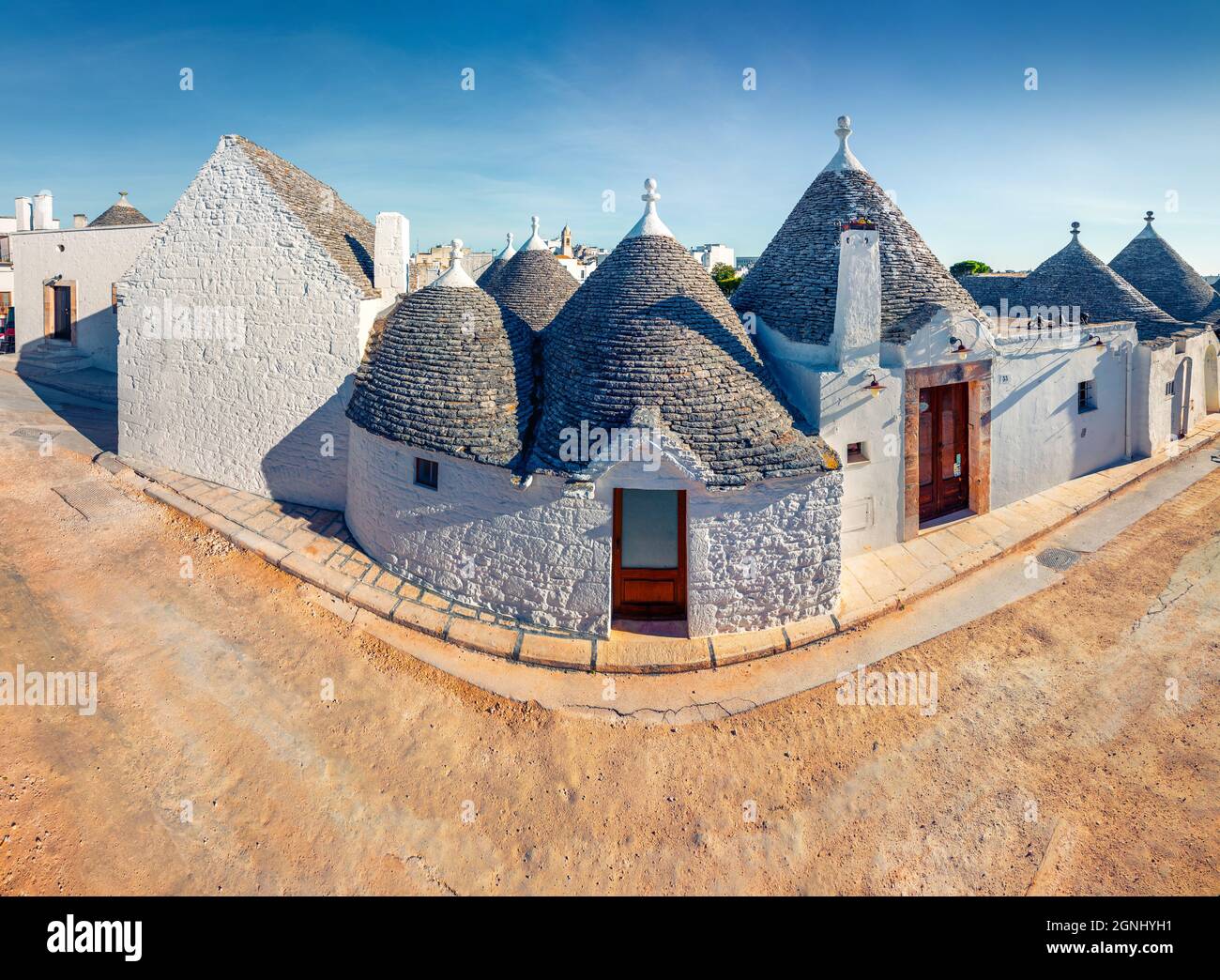 Incredible morning view of strret with trullo (trulli) - traditional ...
