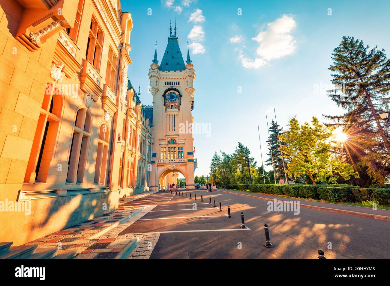 Colorful evening view of Cultural Palace Iasi. Sunny summer cityscape ...