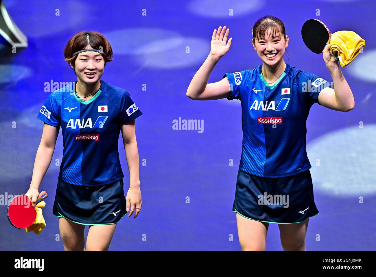 Doha, Qatar. 25th Sep, 2021. Miyu Nagasaki (R) and Minami Ando of Japan react after winning the ...