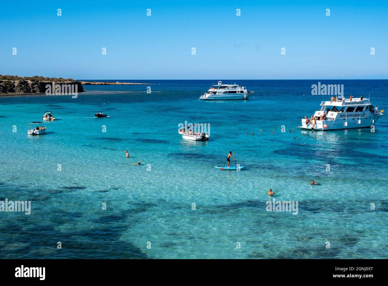 Leisure boats and tourists at the Blue Lagoon on the north coast of the ...