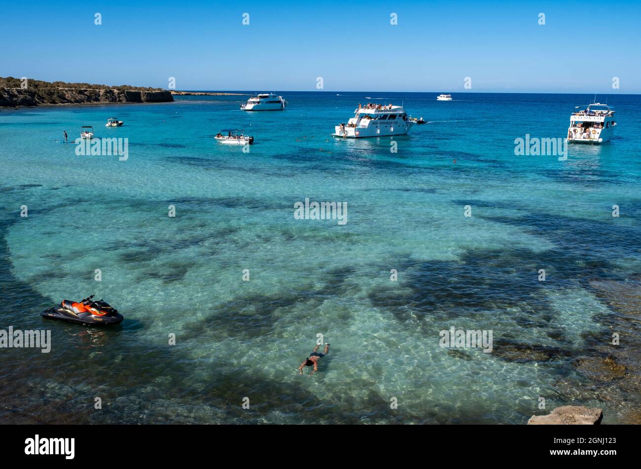 Leisure boats and tourists at the Blue Lagoon on the north coast of the ...
