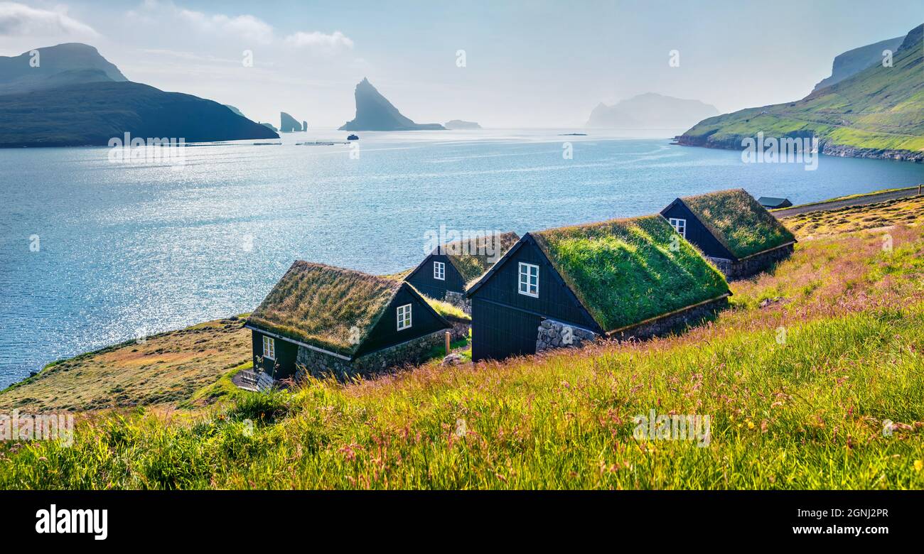 Stunning summer scene of Bour village with typical turf-top houses and ...