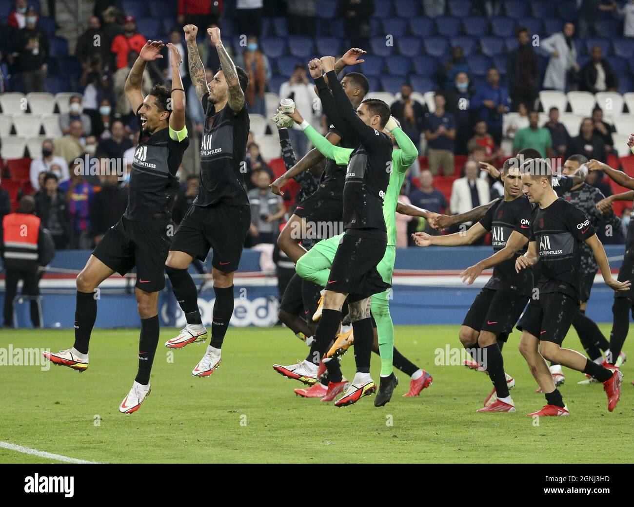 Players of PSG celebrate the victory following the French championship ...