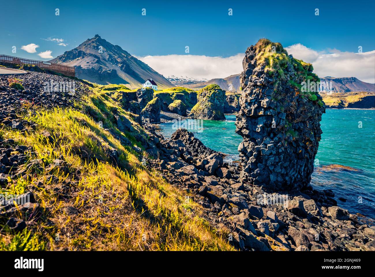 Amazingly shaped basalt columns on the shores of Atlantic Ocean. Sunny ...