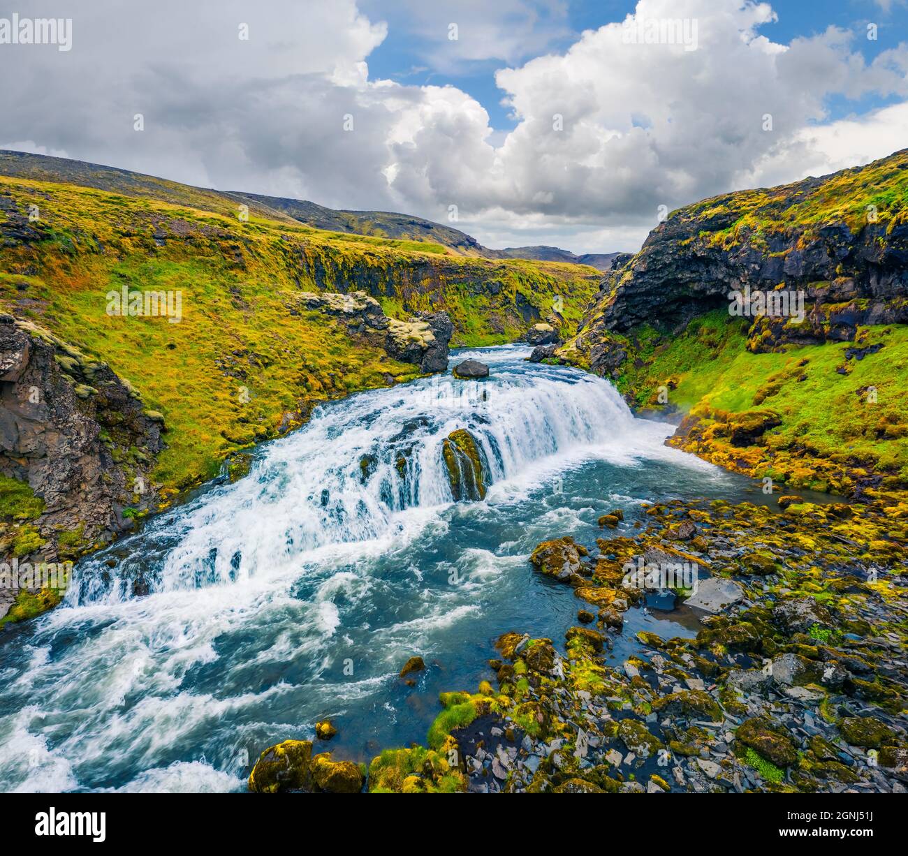 Splendid summer scene of waterfall on Skoga river. Aerial summer view ...