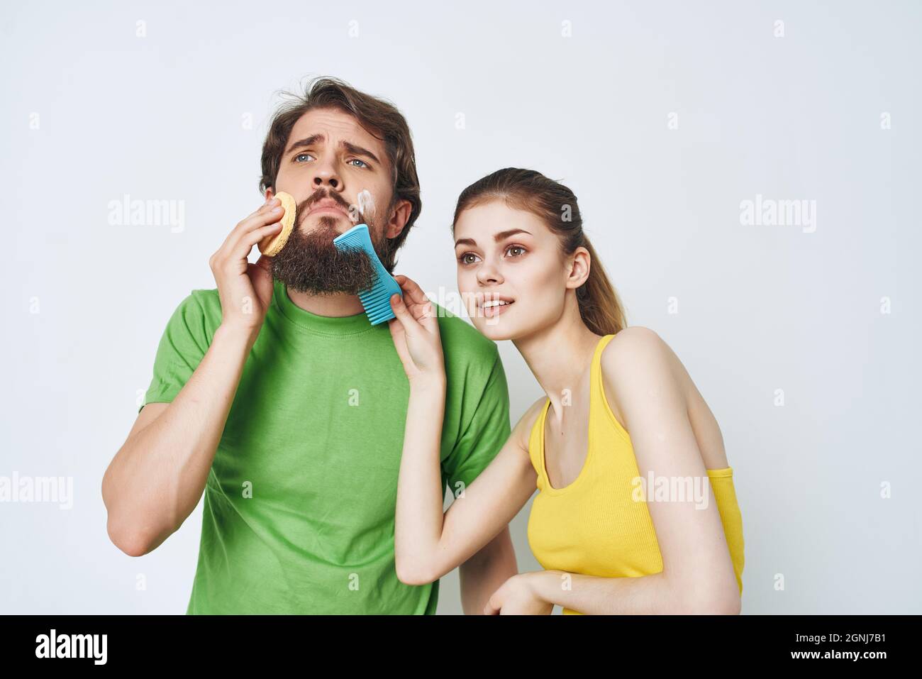young couple in the bathroom morning facial hygiene Stock Photo - Alamy