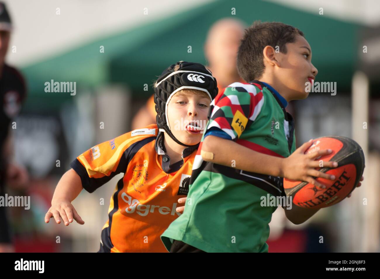 young kids paying rugby Stock Photo - Alamy