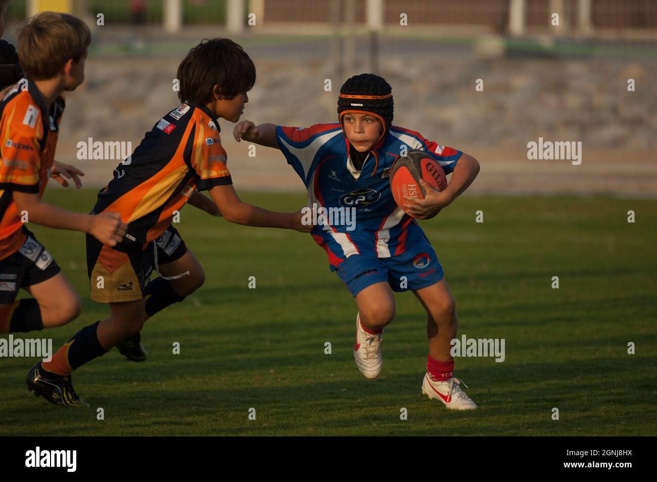 Kids playing tag rugby hi-res stock photography and images - Alamy