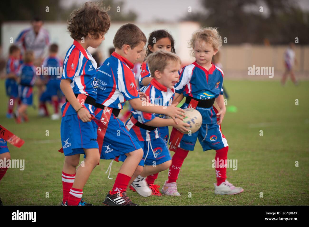 young kids paying rugby Stock Photo - Alamy