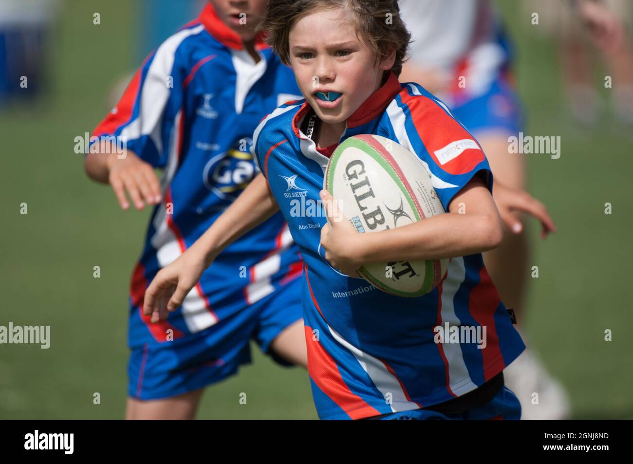 young kids paying rugby Stock Photo - Alamy
