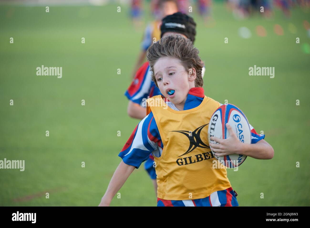 young kids paying rugby Stock Photo - Alamy