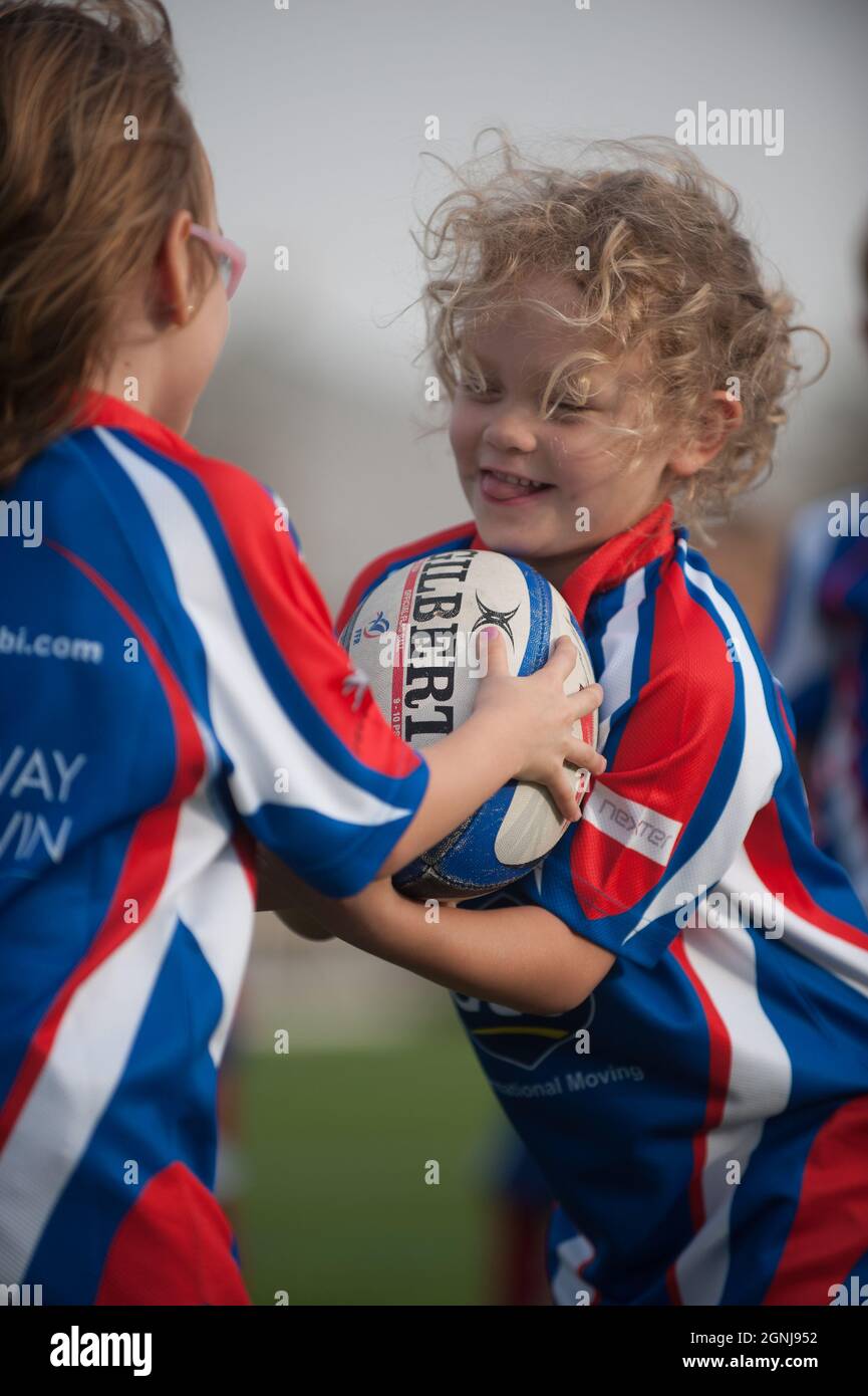 young kids paying rugby Stock Photo - Alamy