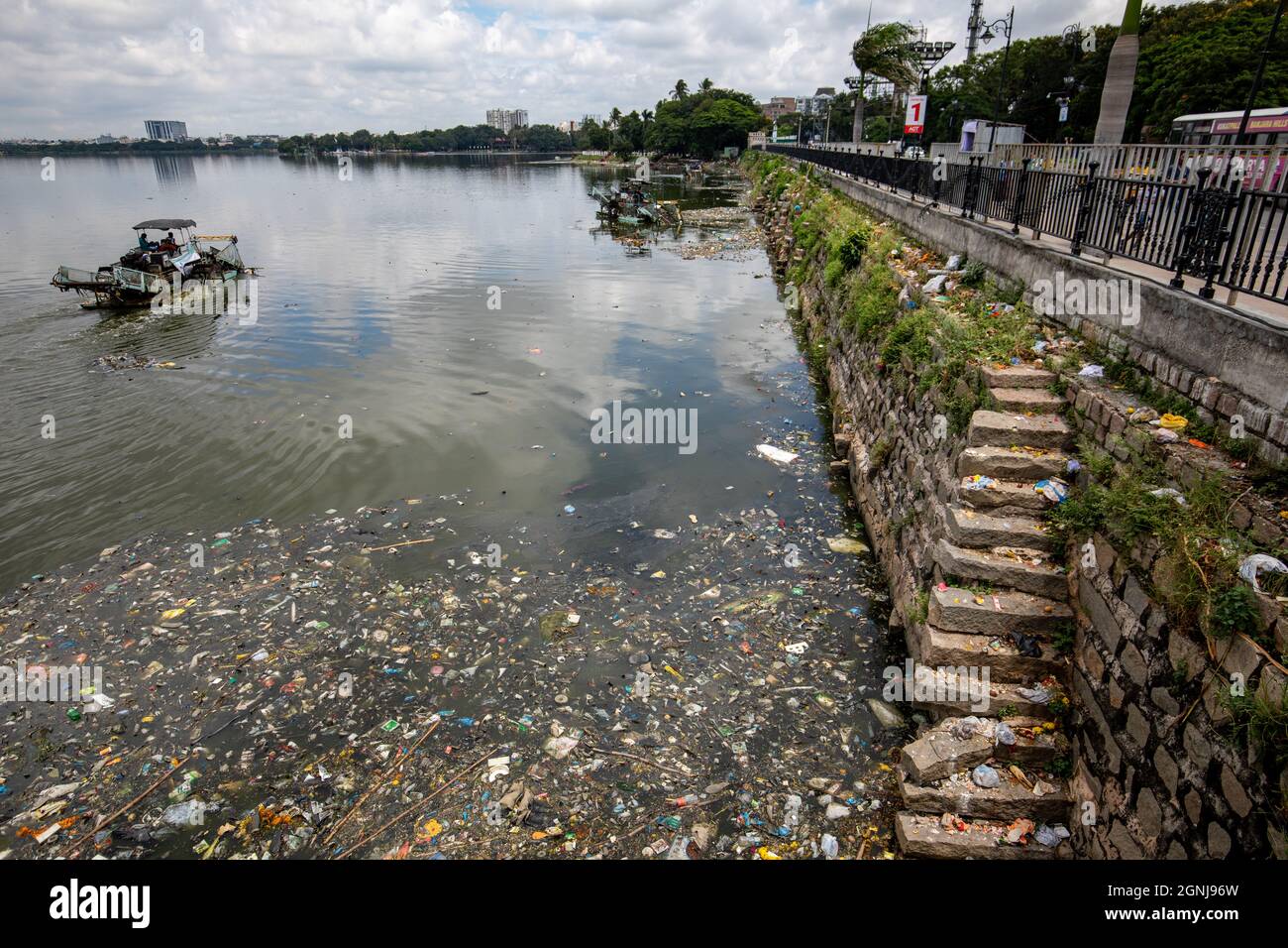 Hyderabad, India.21 September, 2021.A floating trash collector machine ...