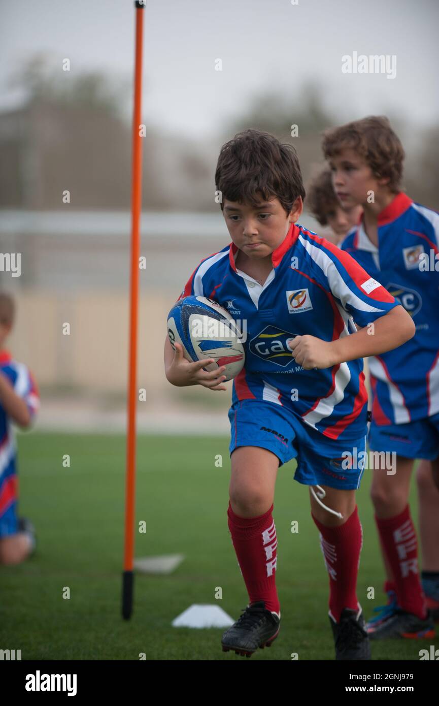 young kids paying rugby Stock Photo - Alamy