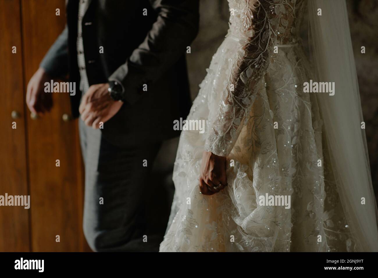 A marrying couple entering the church Stock Photo - Alamy
