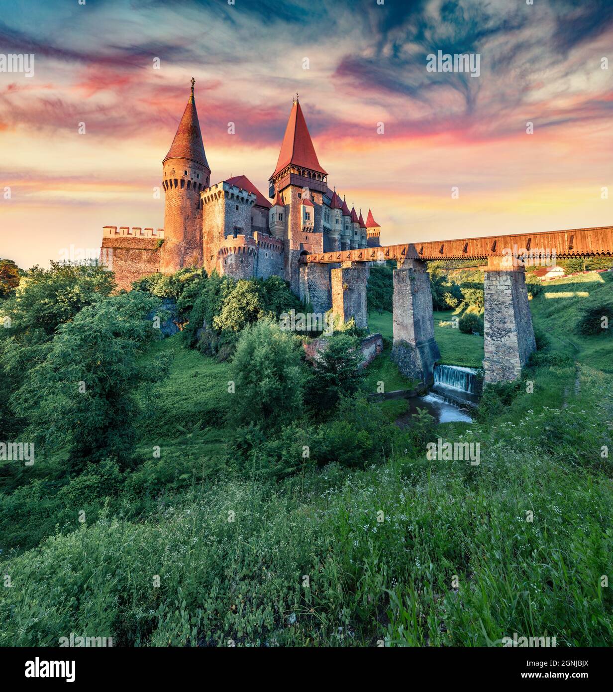 Amazing evening view of Hunyad Castle / Corvin's Castle. Colorful ...