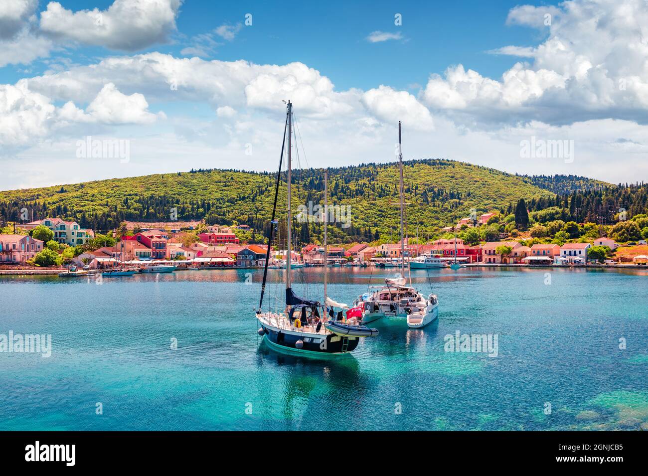Spectacular morning view of Fiskardo port. Colorful summer seascape of ...