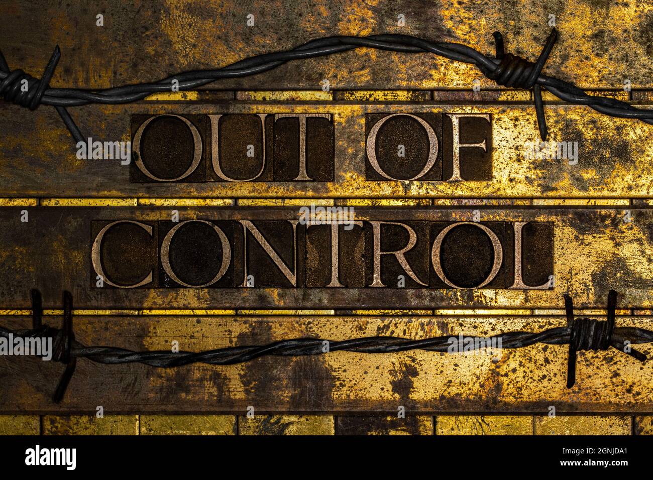 Out of Control text on textured grunge copper and vintage gold ...