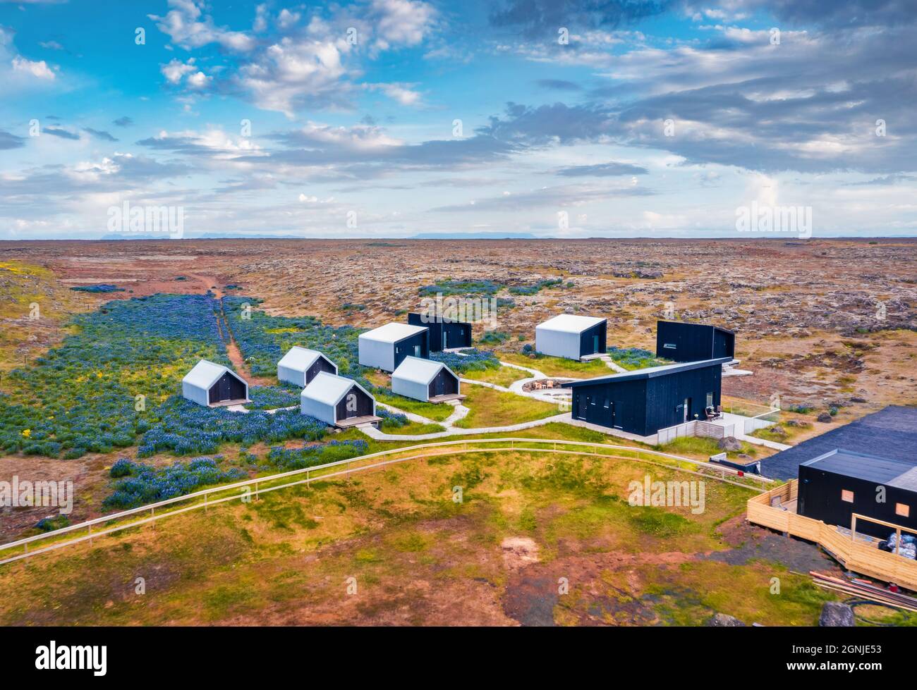 Modern icelandic building in volcanic desert among the field of ...