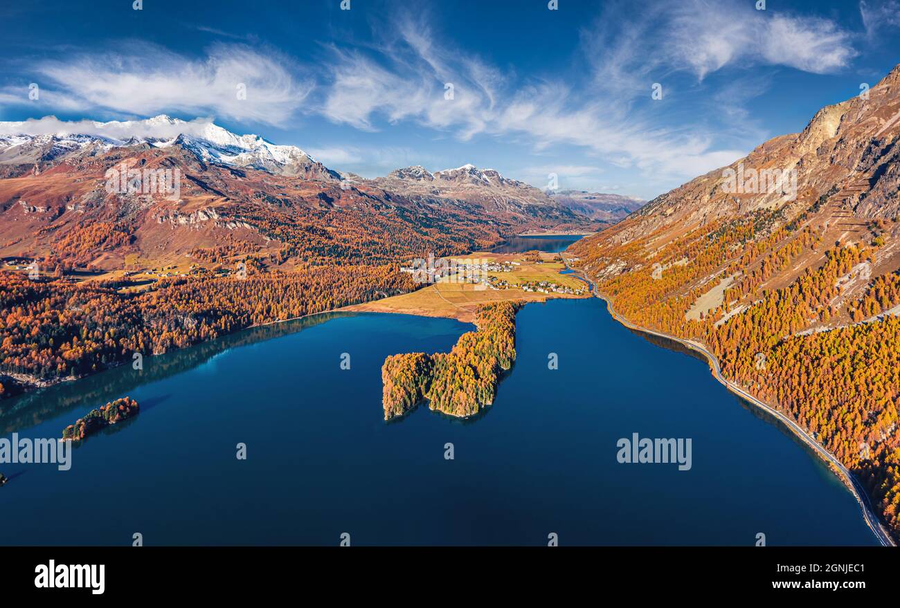 Amazing afternoon view from flying drone of Sils lake. Fantastic autumn ...